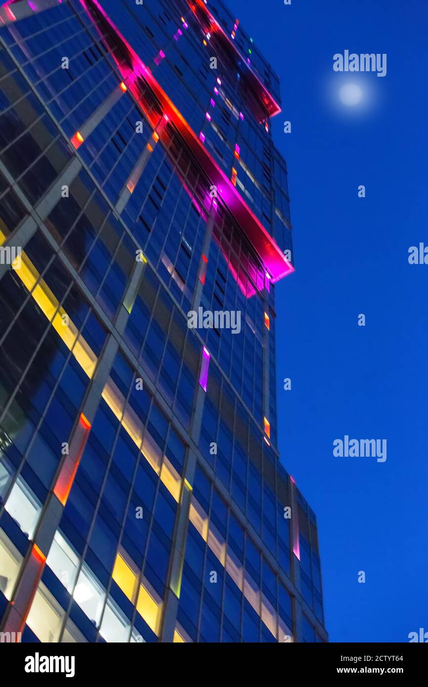 Modern high corporate building at night Stock Photo - Alamy