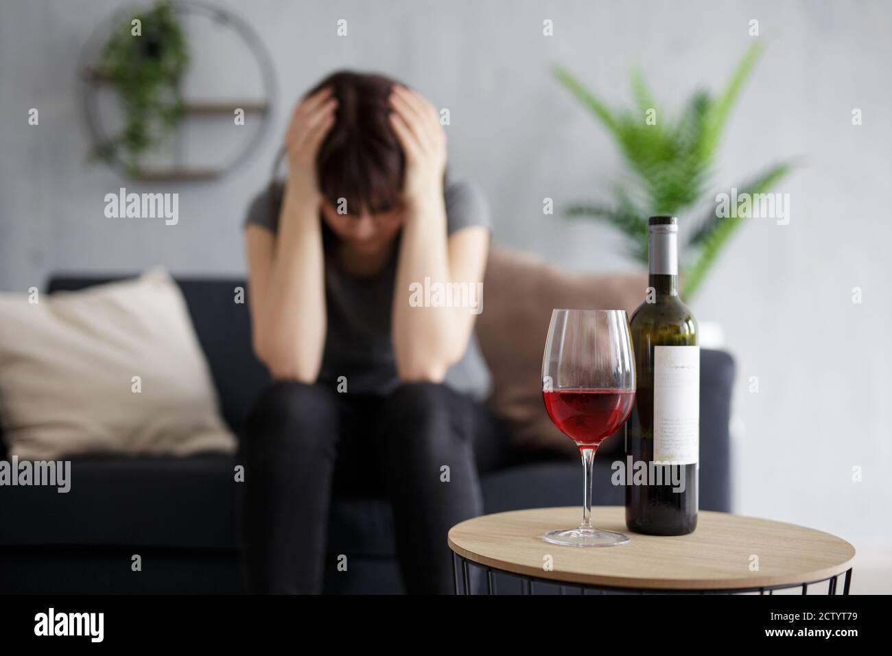 alcoholism and depression concept - young stressed woman crying and ...