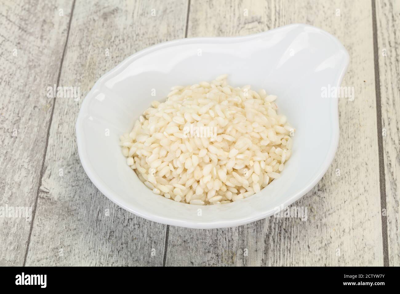Raw Arborio rice for Italian risotto Stock Photo - Alamy