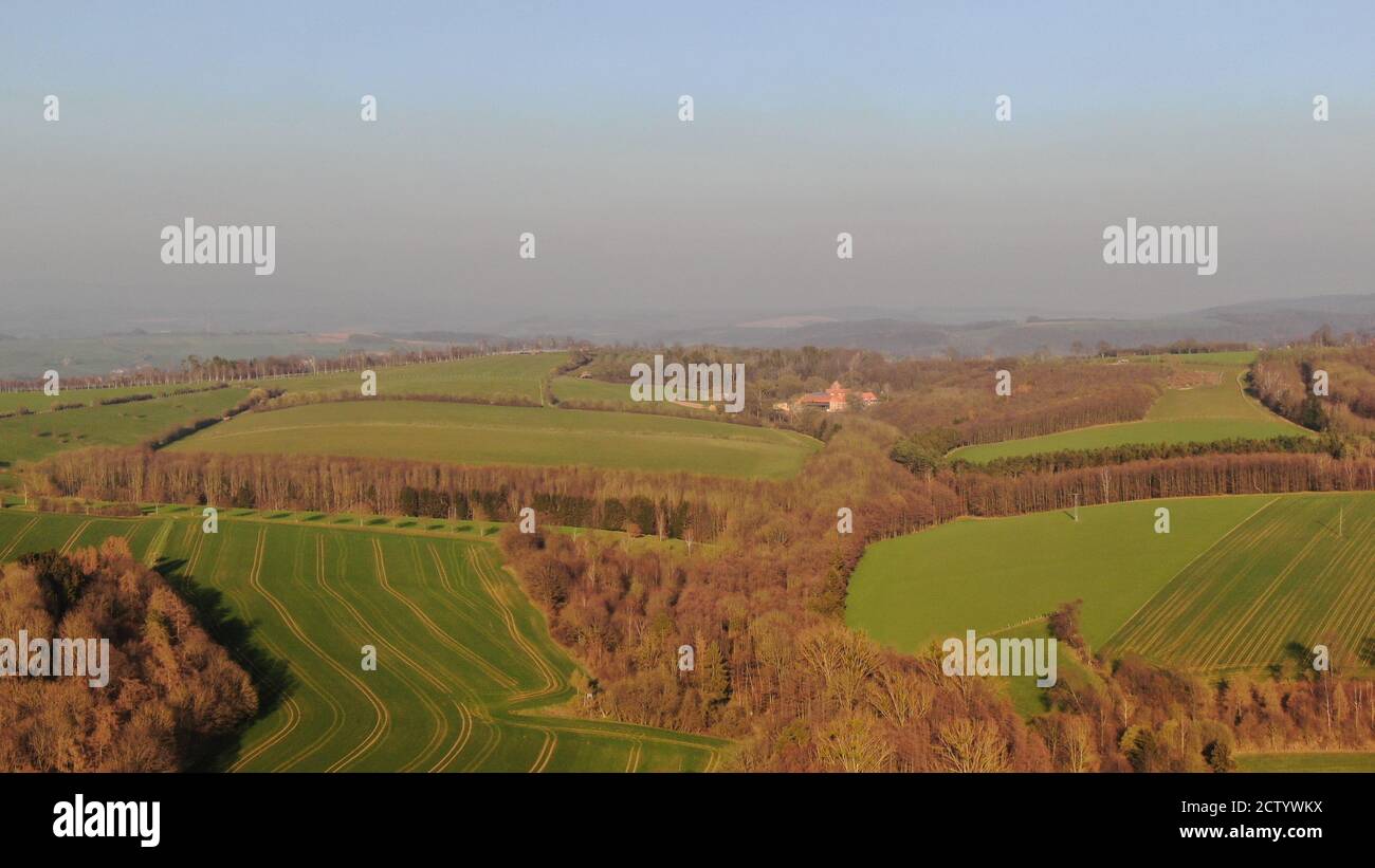 typical landscape in the north of germany. Allot of trees and some ...