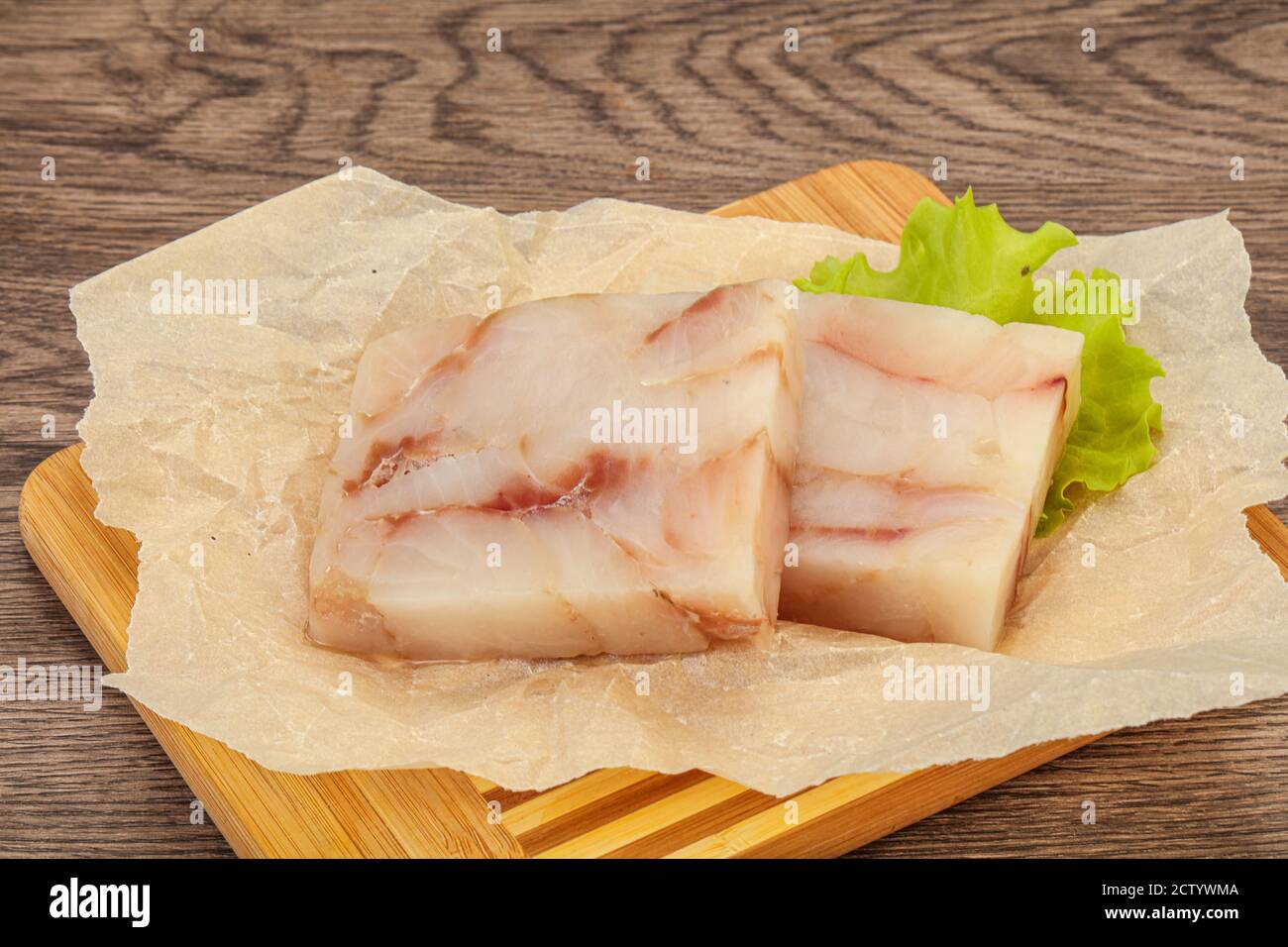 Raw dietary pollock fish fillet for cooking Stock Photo - Alamy