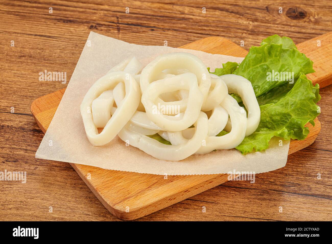 Raw squid rings ready for cooking Stock Photo - Alamy