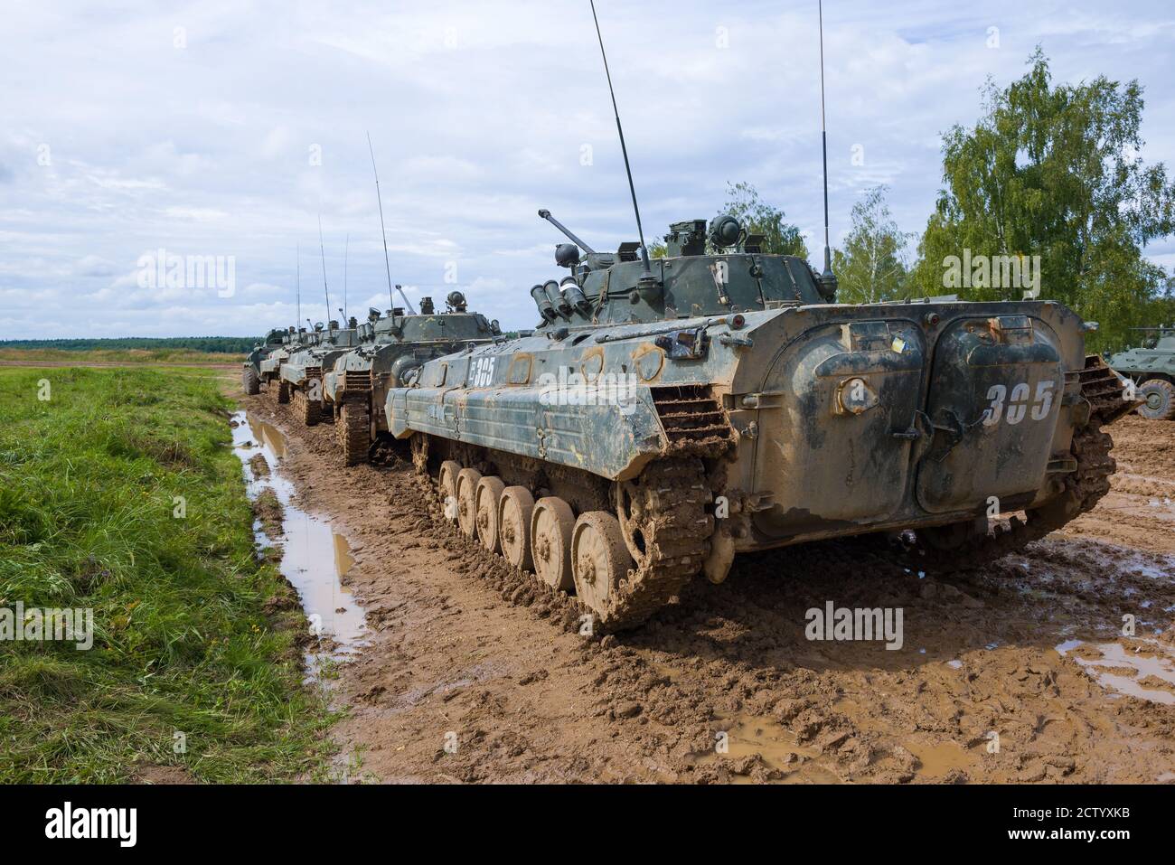 ALABINO, RUSSIA - AUGUST 27, 2020: Convoy of BMP-3 at the exit to the landfill. Fragment of the ...