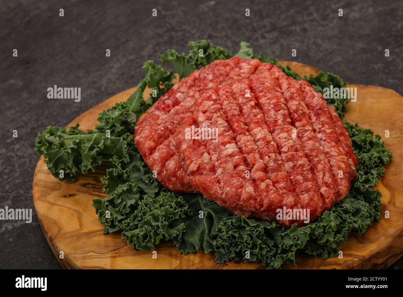 Raw beef burger cutlet for grill Stock Photo - Alamy