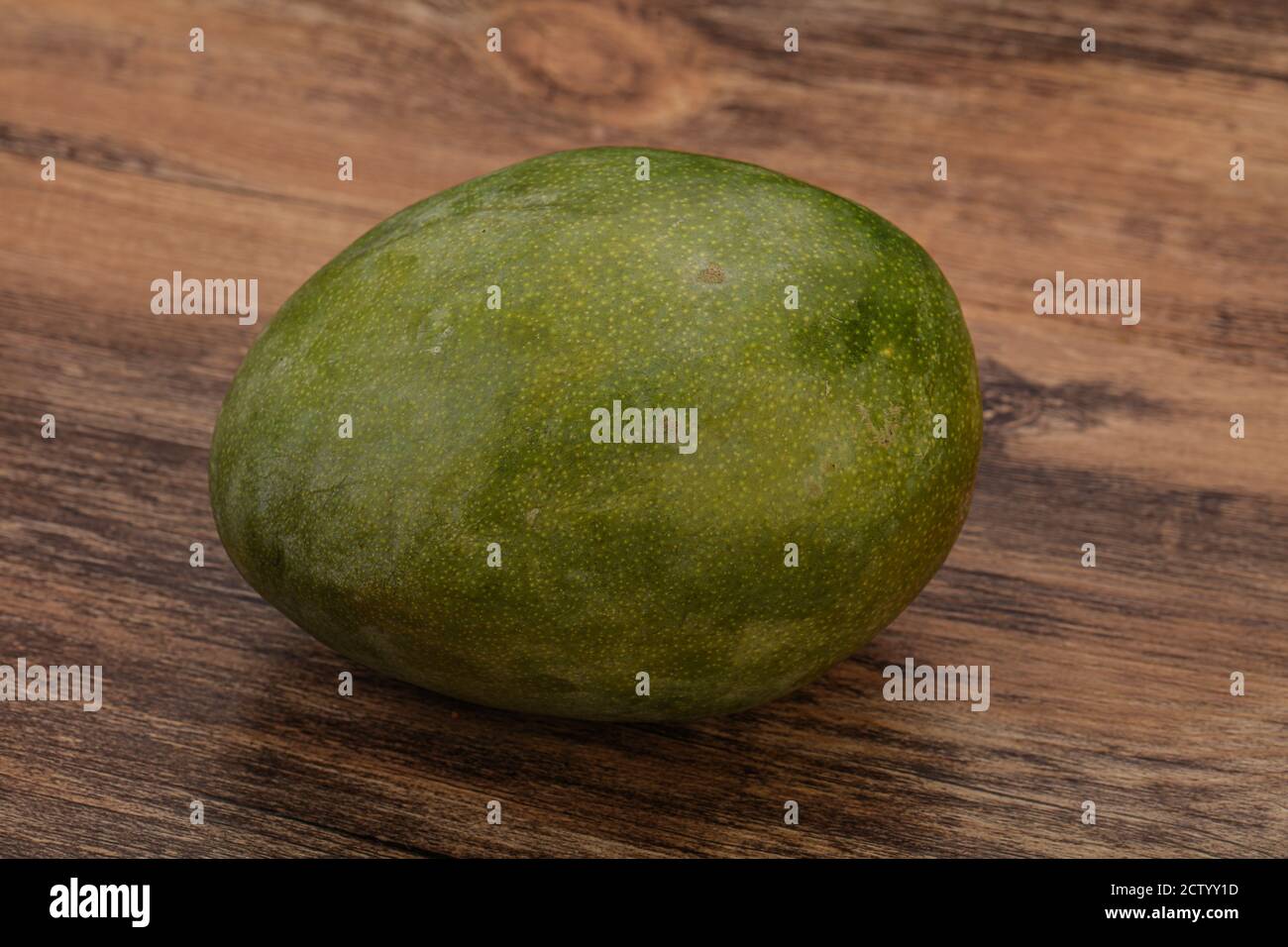 Tropical fruit - Green sweet tasty mango Stock Photo - Alamy