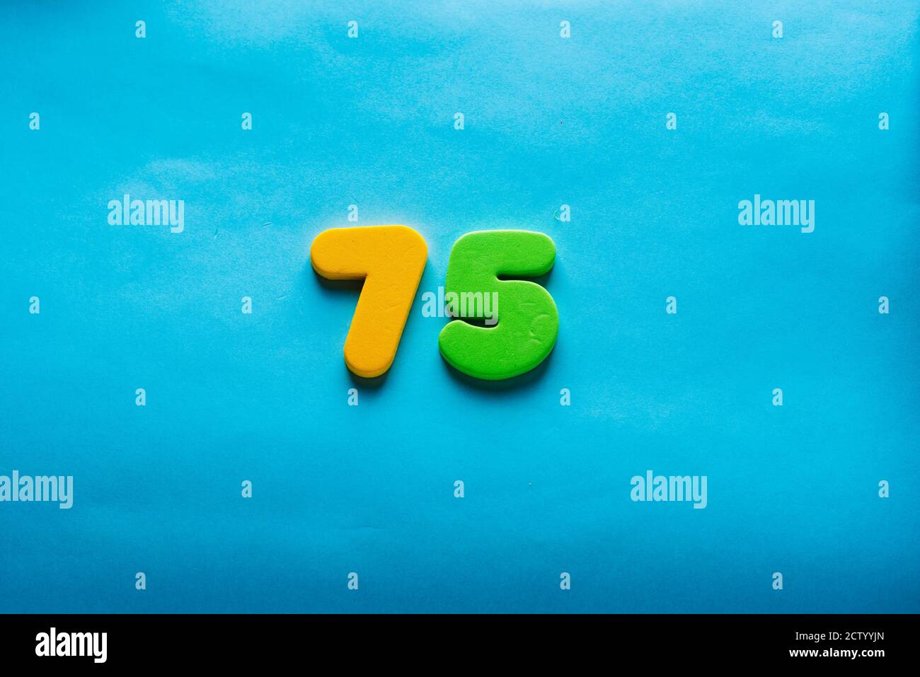 75 years old celebrating classic logo. Colored happy anniversary 75 th ...