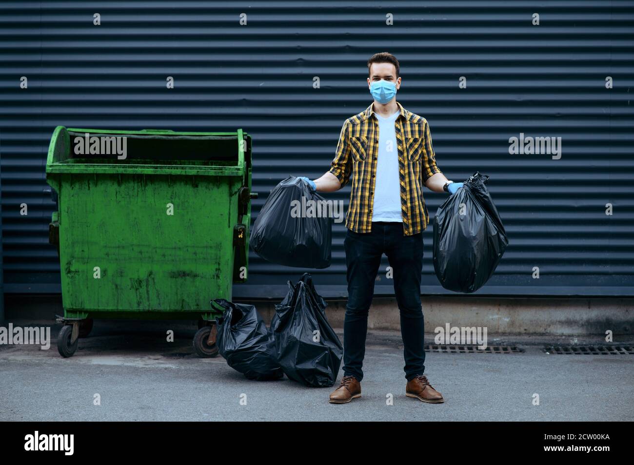 Waste collection plastic recycling volunteer hi-res stock photography ...