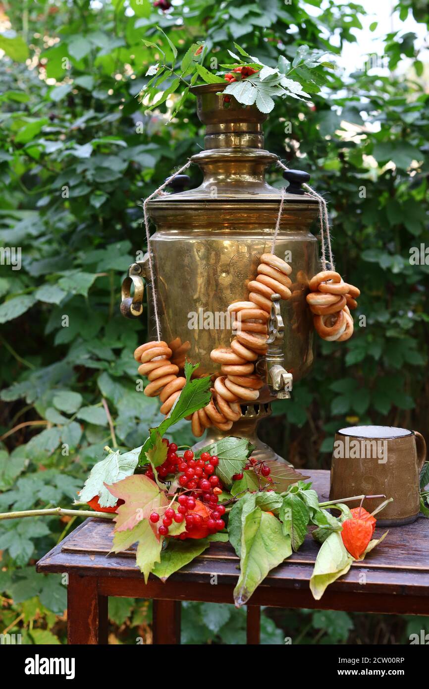 still life Russian samovar with dryers in the garden Stock Photo - Alamy
