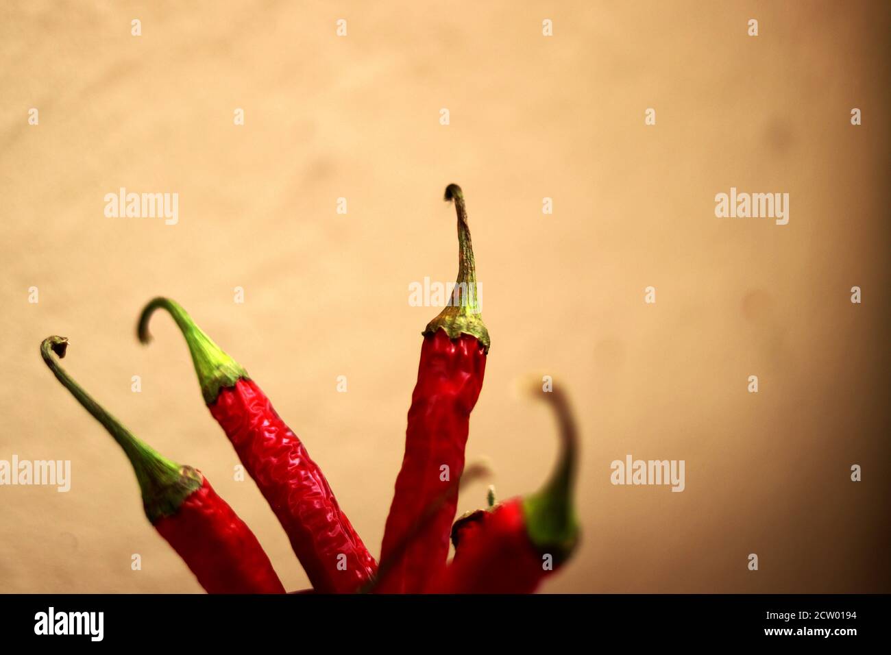 Chili peppers close up - background Stock Photo - Alamy