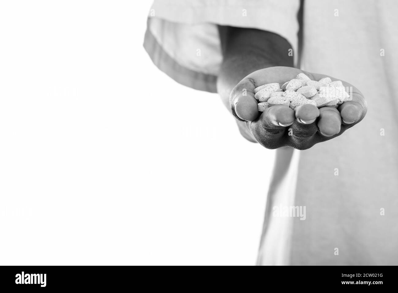 Hand holding vitamin tablets hi-res stock photography and images - Alamy