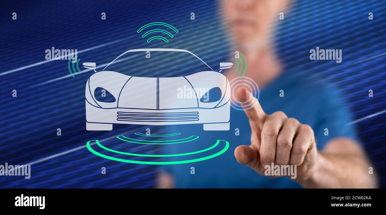 Man touching a smart car concept on a touch screen with his finger ...