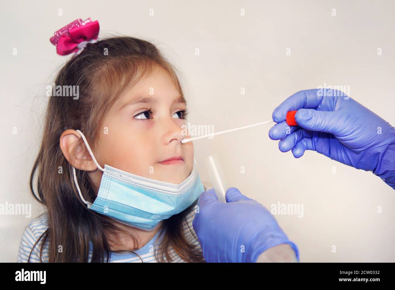 Screening virus, doctor taking nasal mucus test sample from nose ...