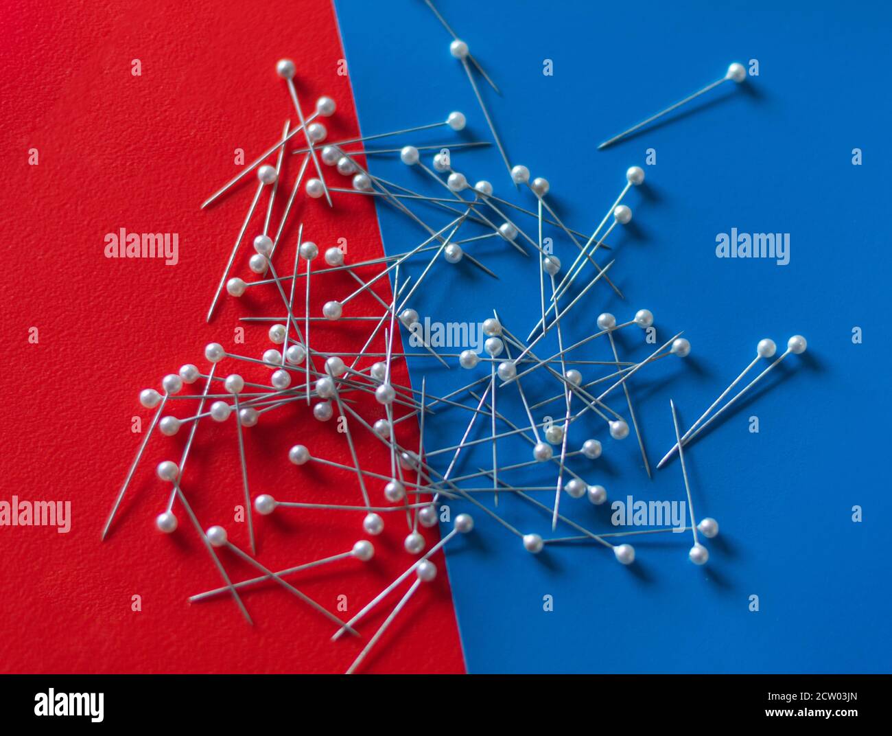 silver office marker pins on plastic of colors Stock Photo - Alamy