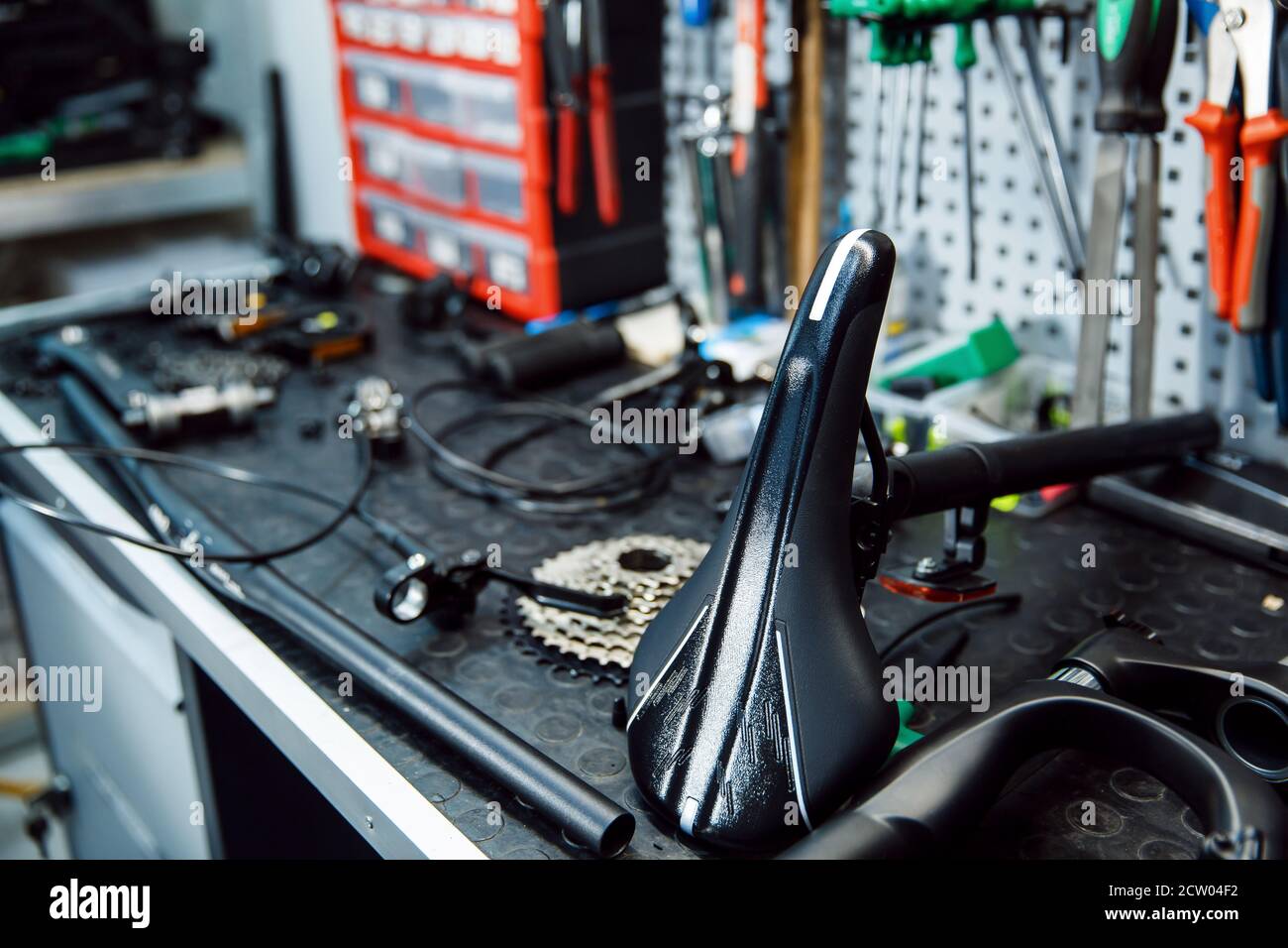 Bicycle workshop, new cycle parts on the table Stock Photo - Alamy