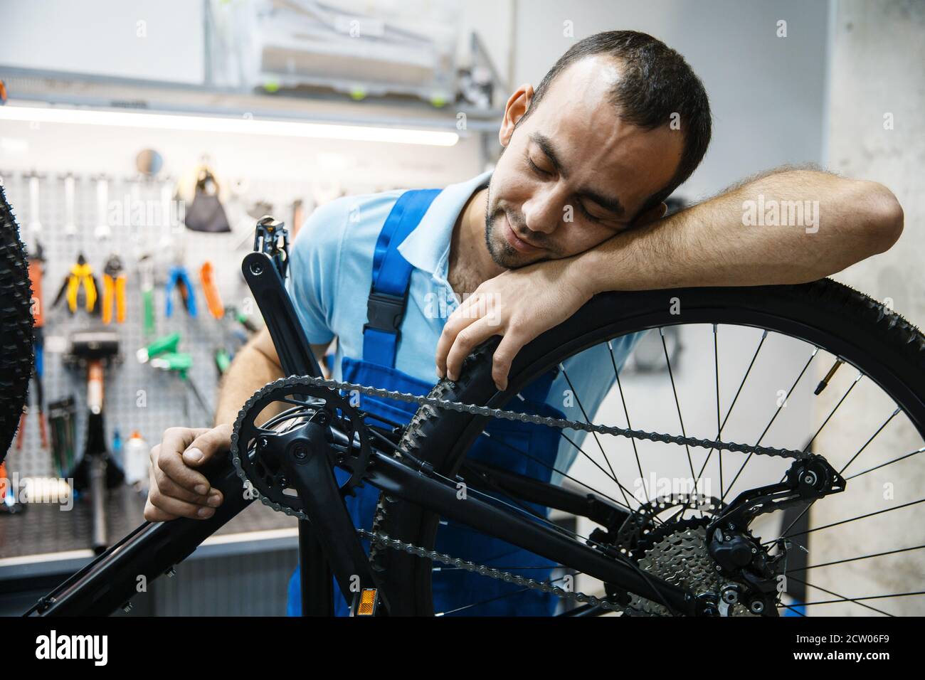 Cycling repairman hi-res stock photography and images - Alamy
