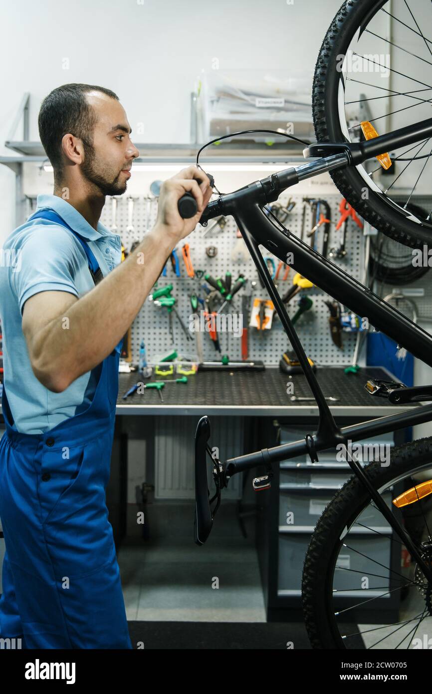 Assembling bicycle hi-res stock photography and images - Alamy