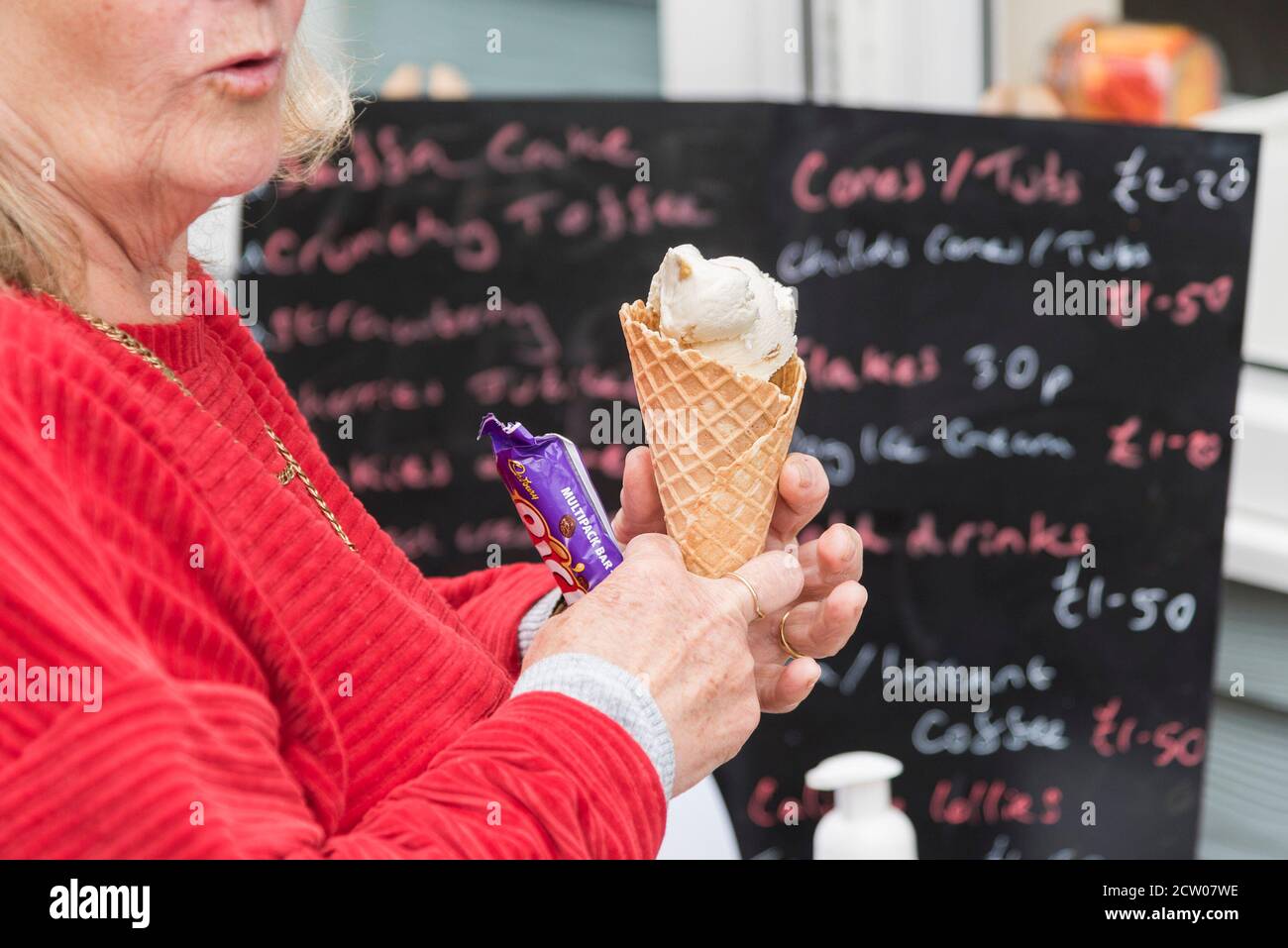 Customer buying ice cream Stock Photo - Alamy