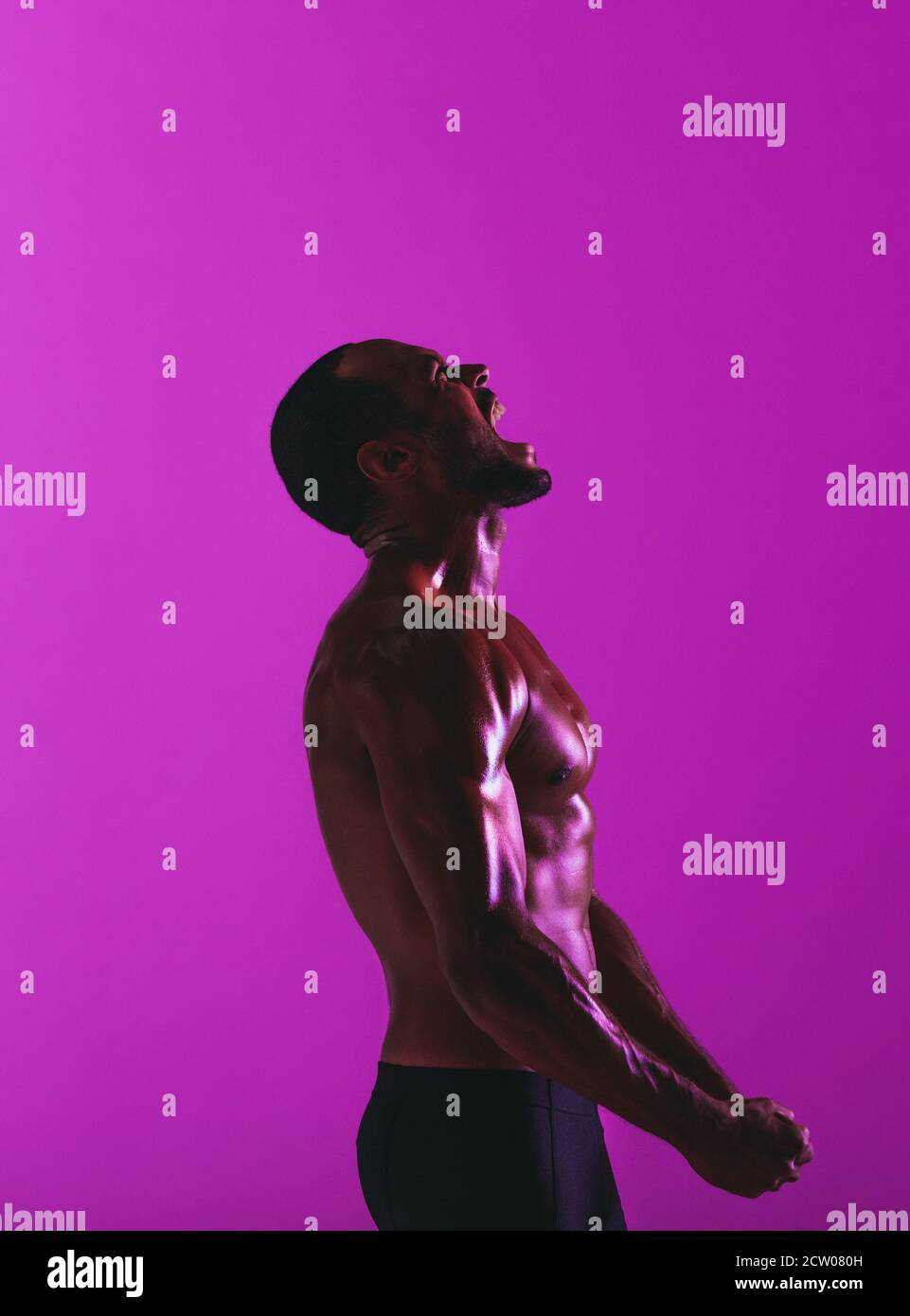 Side view portrait of african american athlete shouting. Fit man ...