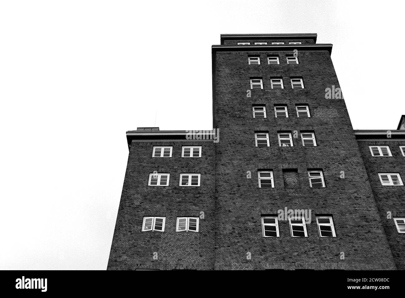 Old and tall factory building - Black and white Stock Photo - Alamy