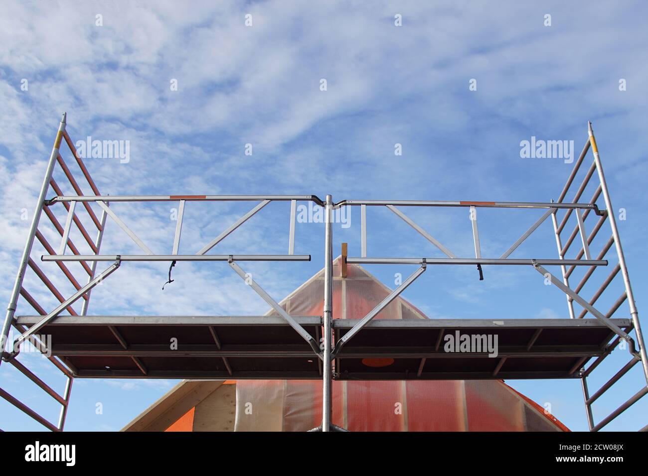 Scaffolding at a house currently under construction protected from the ...
