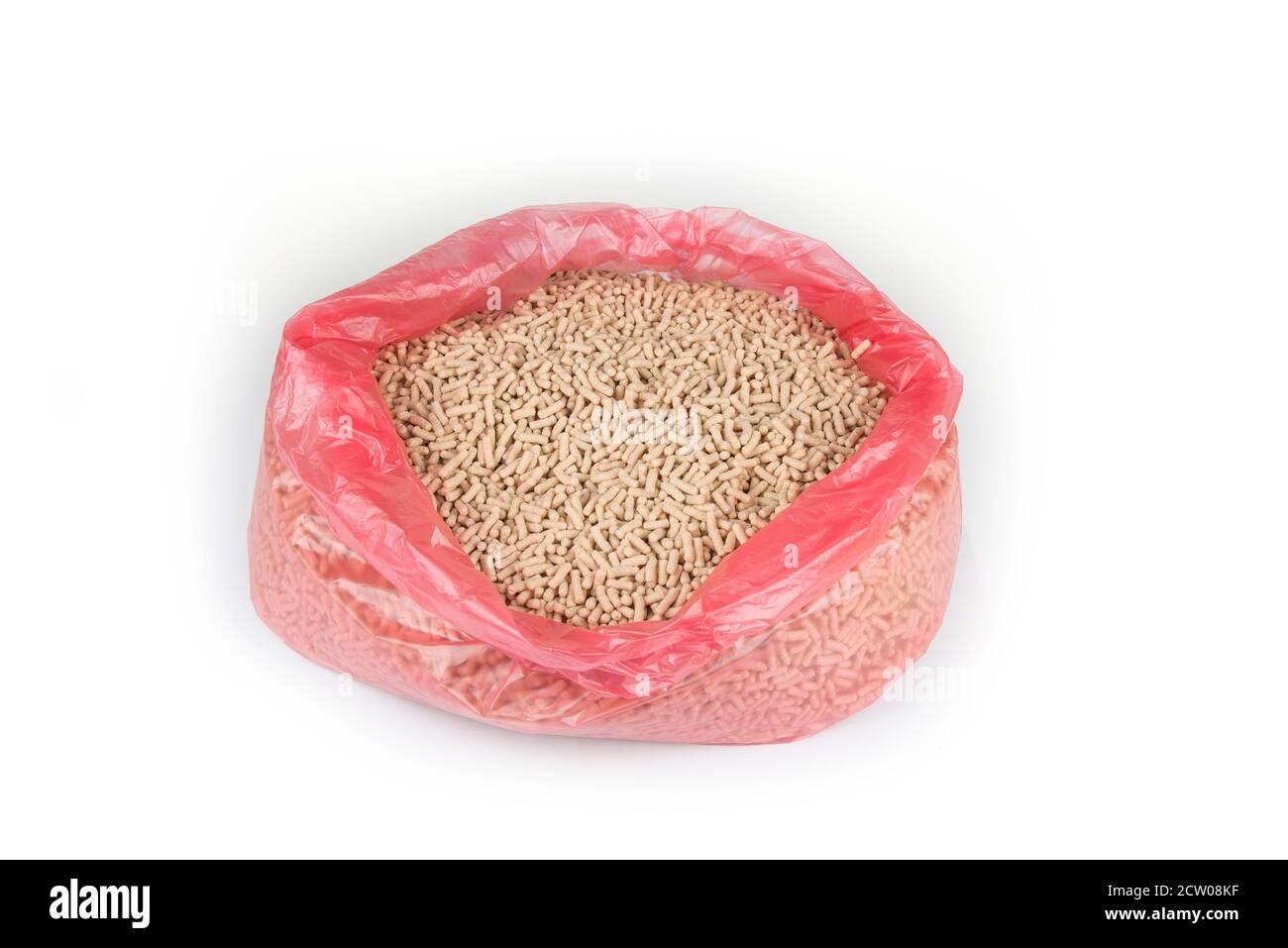 Bag of pelleted animal food on a white Stock Photo - Alamy