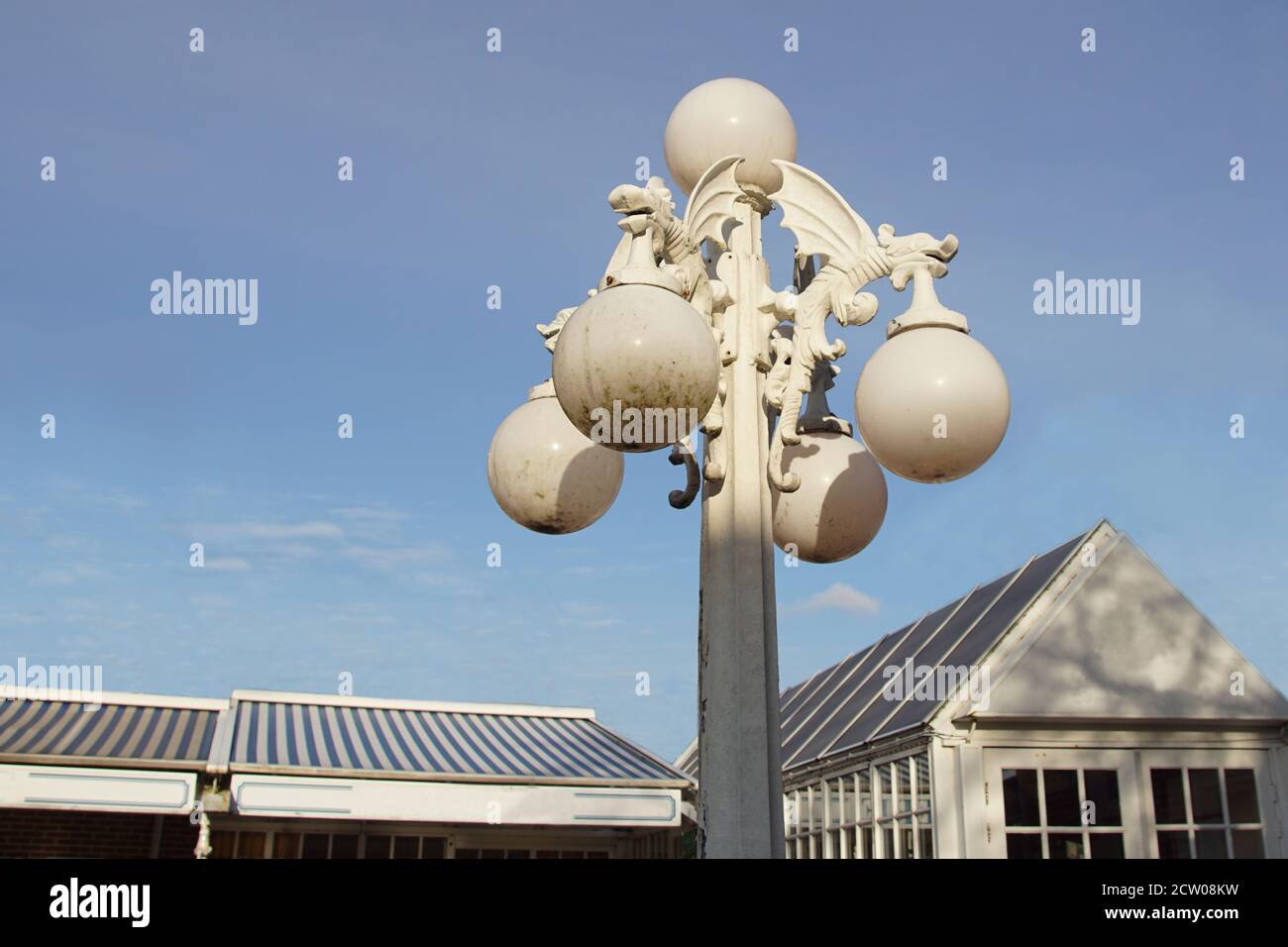 Street lamp post with 5 globes decorated with dragons. December ...