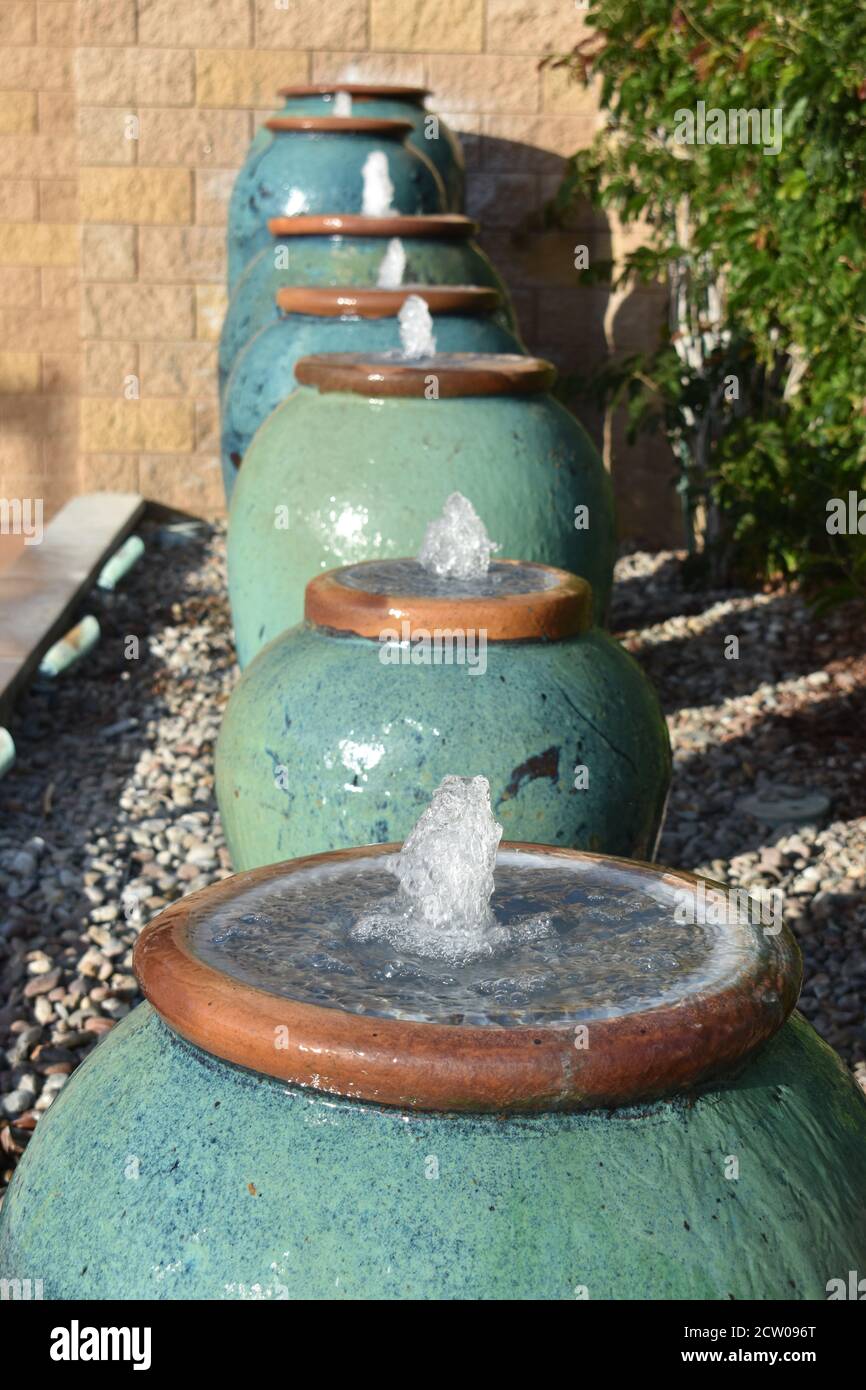 Row water fountains in park hi-res stock photography and images - Alamy