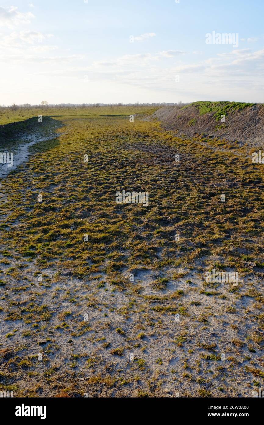 The exposed bottom of a dry pond. Landscape Stock Photo - Alamy