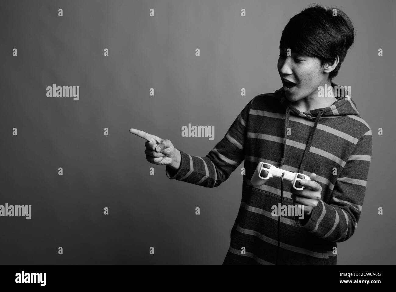 Young man youth playing Black and White Stock Photos & Images - Alamy