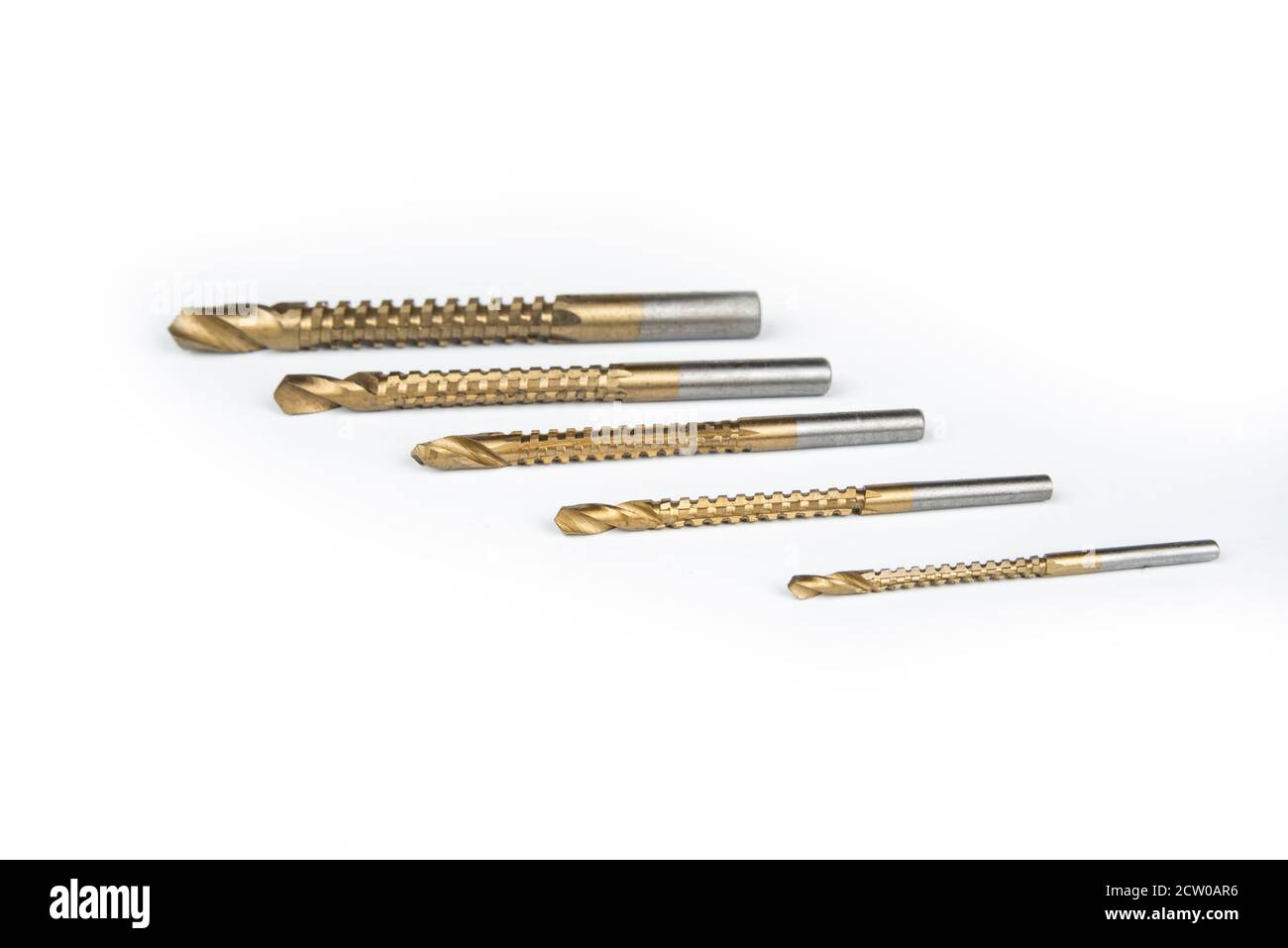 Router drill machine bit set on a white background Stock Photo - Alamy