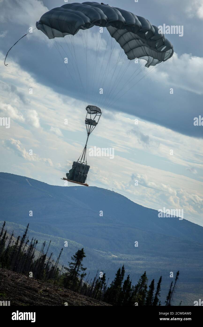 A joint precision airdrop system prepares to land on a landing zone for ...