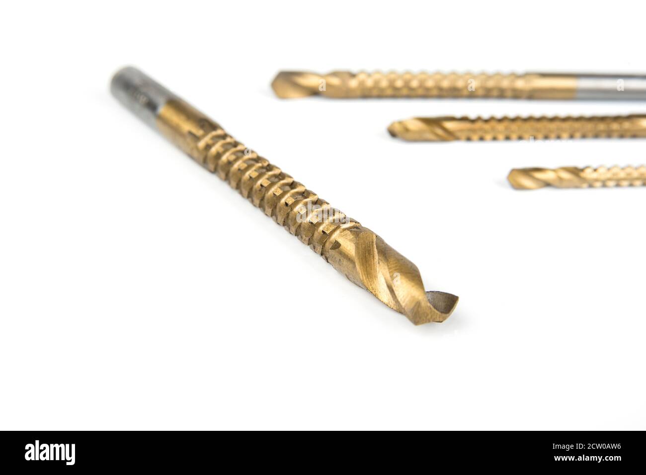 Router drill machine bit set on a white background Stock Photo - Alamy