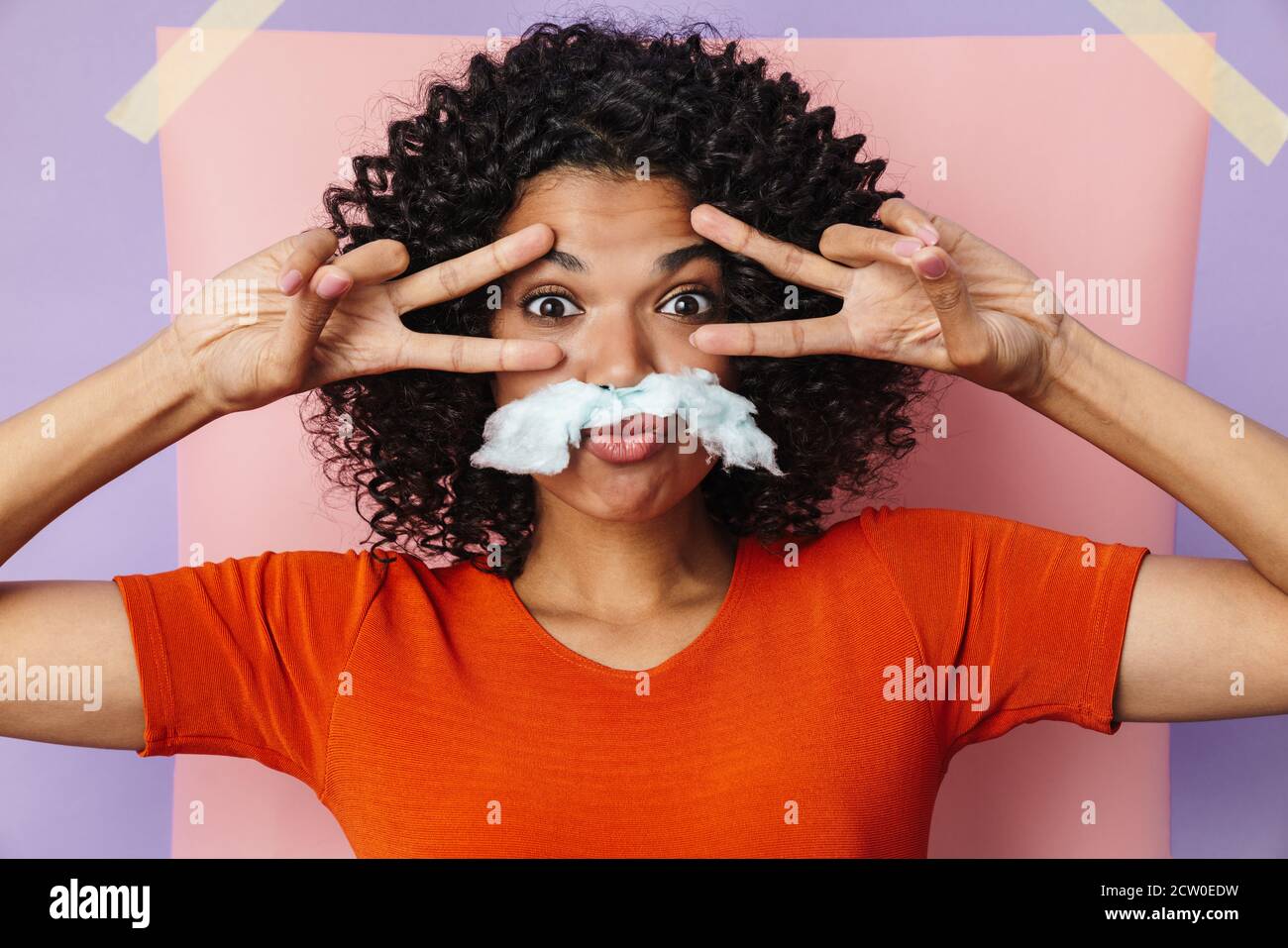 Image of african american woman with cotton candy mustache gesturing ...