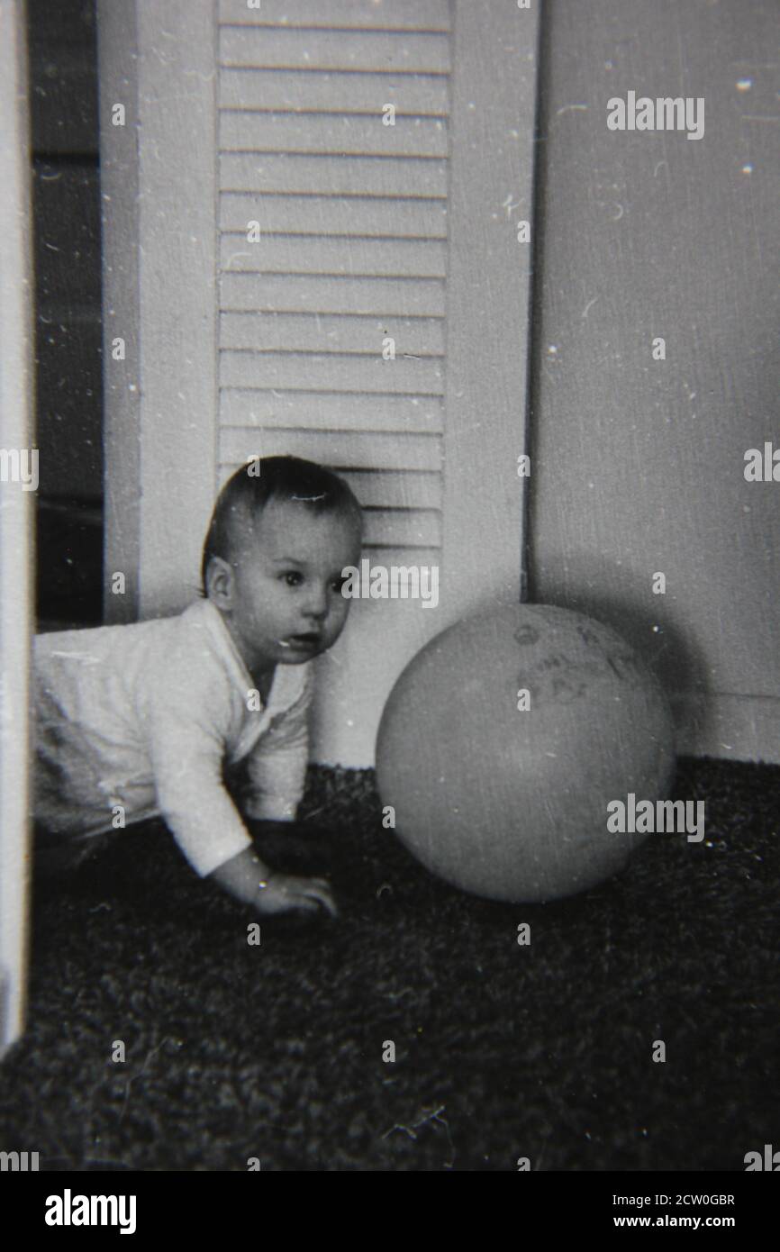 Fine 1970s vintage black and white photography of a cute baby ...