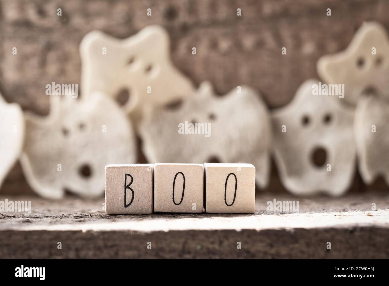 Halloween background with wooden cubes with the word Boo and various ...