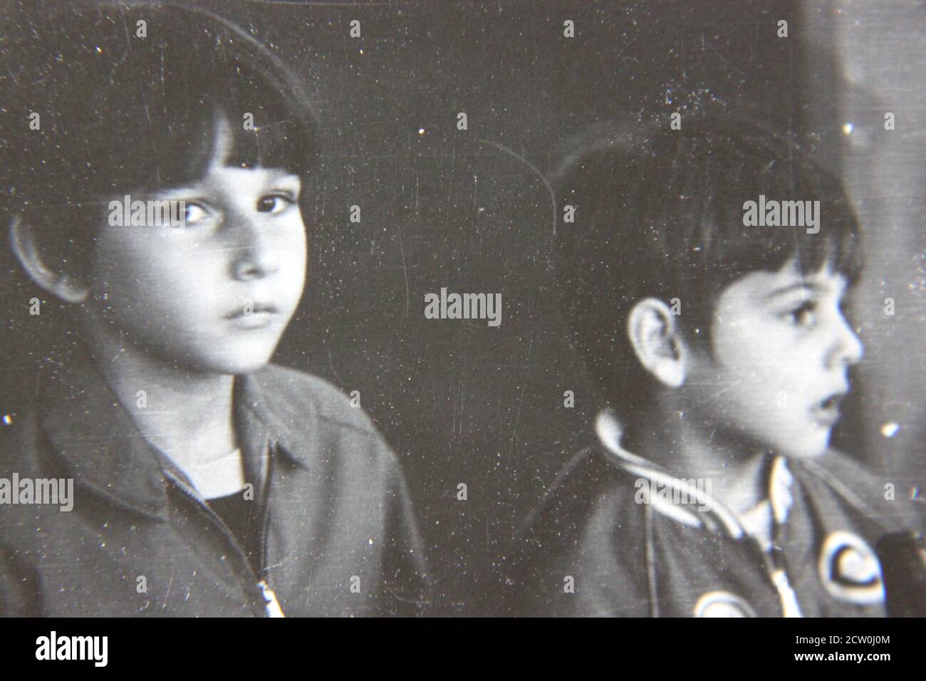 Fine 1970s vintage black and white photography of two boys watching ...