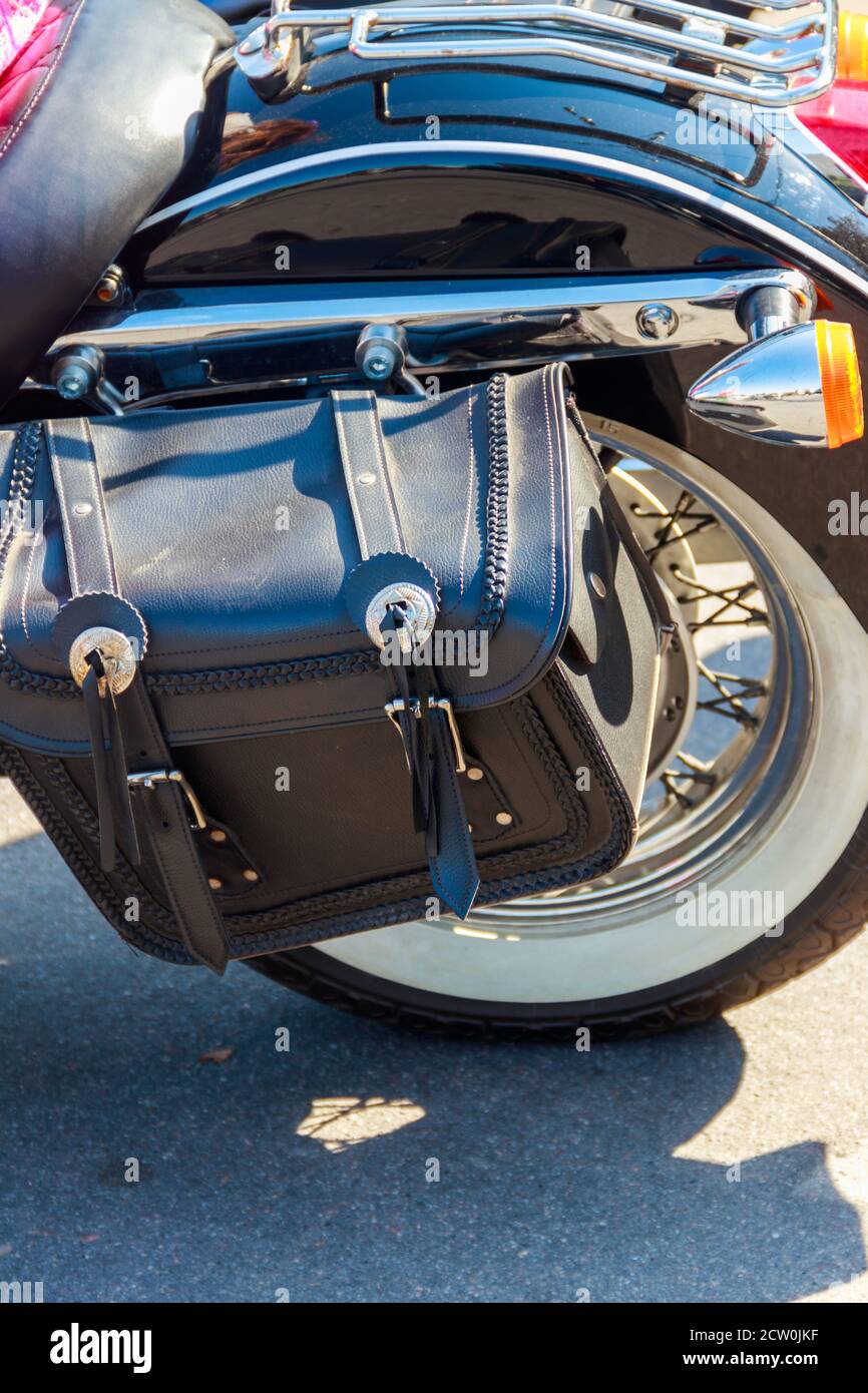 Leather biker bag on a motorcycle close-up. Concept travel on a ...