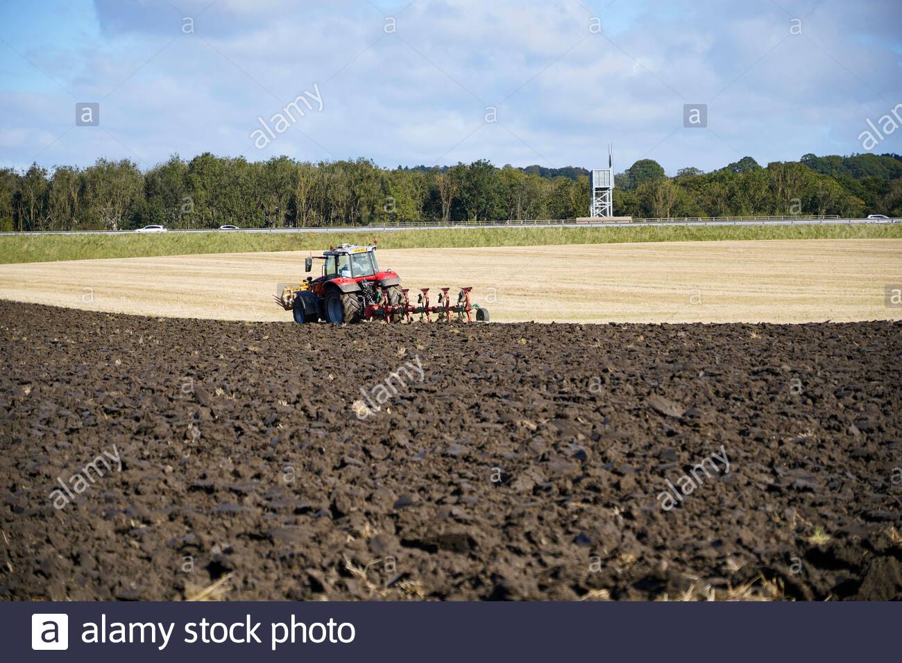 West Lothian, Scotland, UK. 26th Sep 2020. Farm tractors ploughing and ...