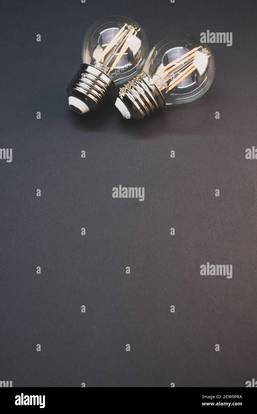 Vertical shot of incandescent light bulbs Stock Photo - Alamy