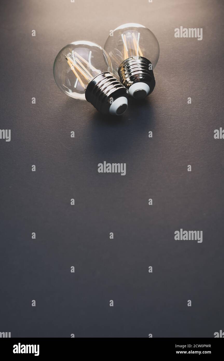 Vertical shot of incandescent light bulbs Stock Photo - Alamy