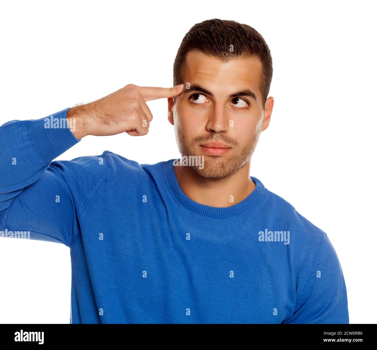 handsome thoughtful young man in blouse on white background Stock Photo ...