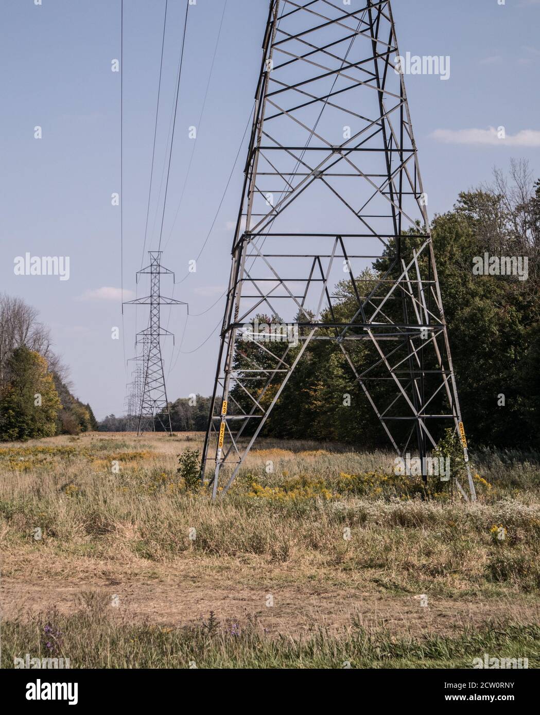 Overhead High Voltage Lines Passing Thru Farmlands Stock Photo Alamy