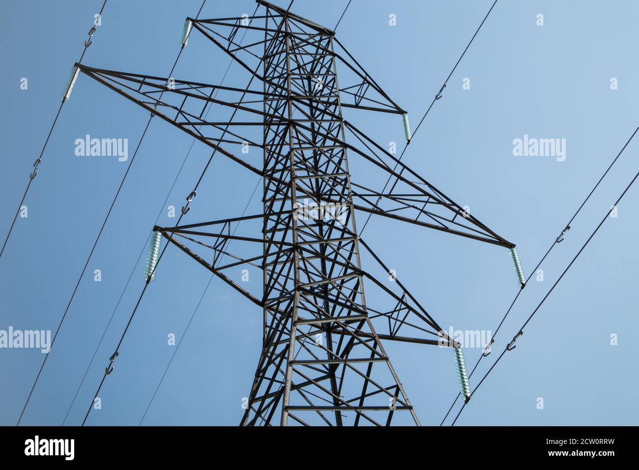 Overhead high voltage lines Stock Photo - Alamy
