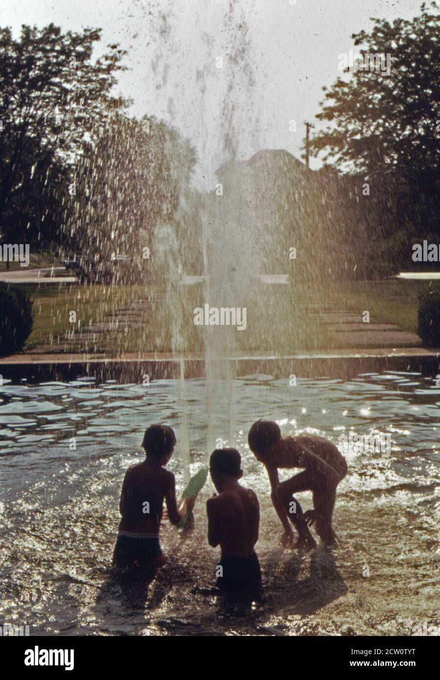 1970s kids in a park hi-res stock photography and images - Alamy
