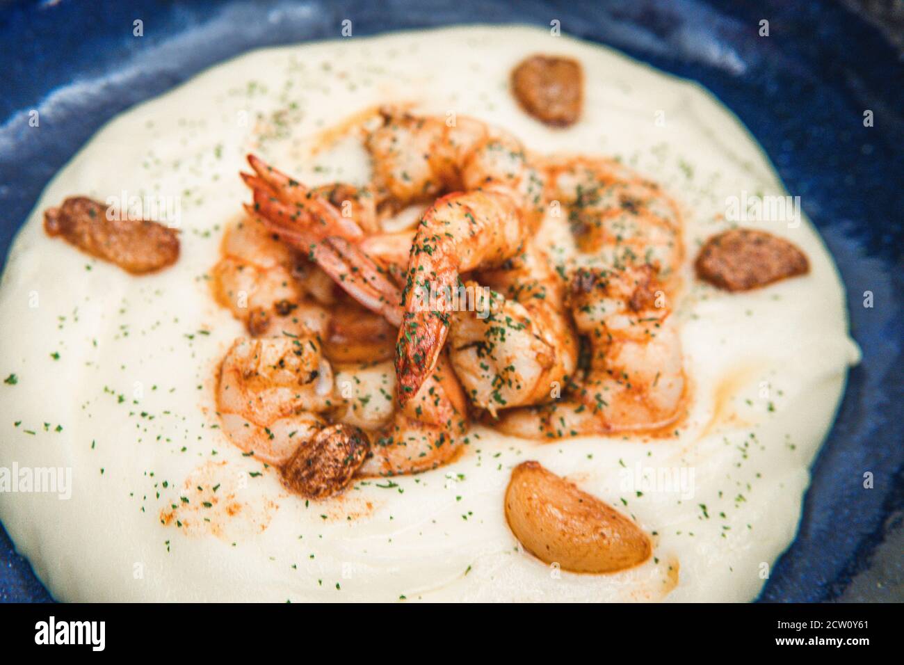 greek and mediterranean food aligot shrimp with garlic Stock Photo - Alamy