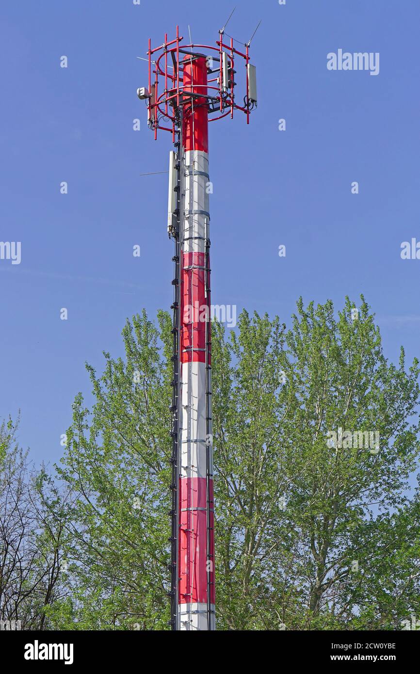 New tall mobile cell network communication tower Stock Photo - Alamy