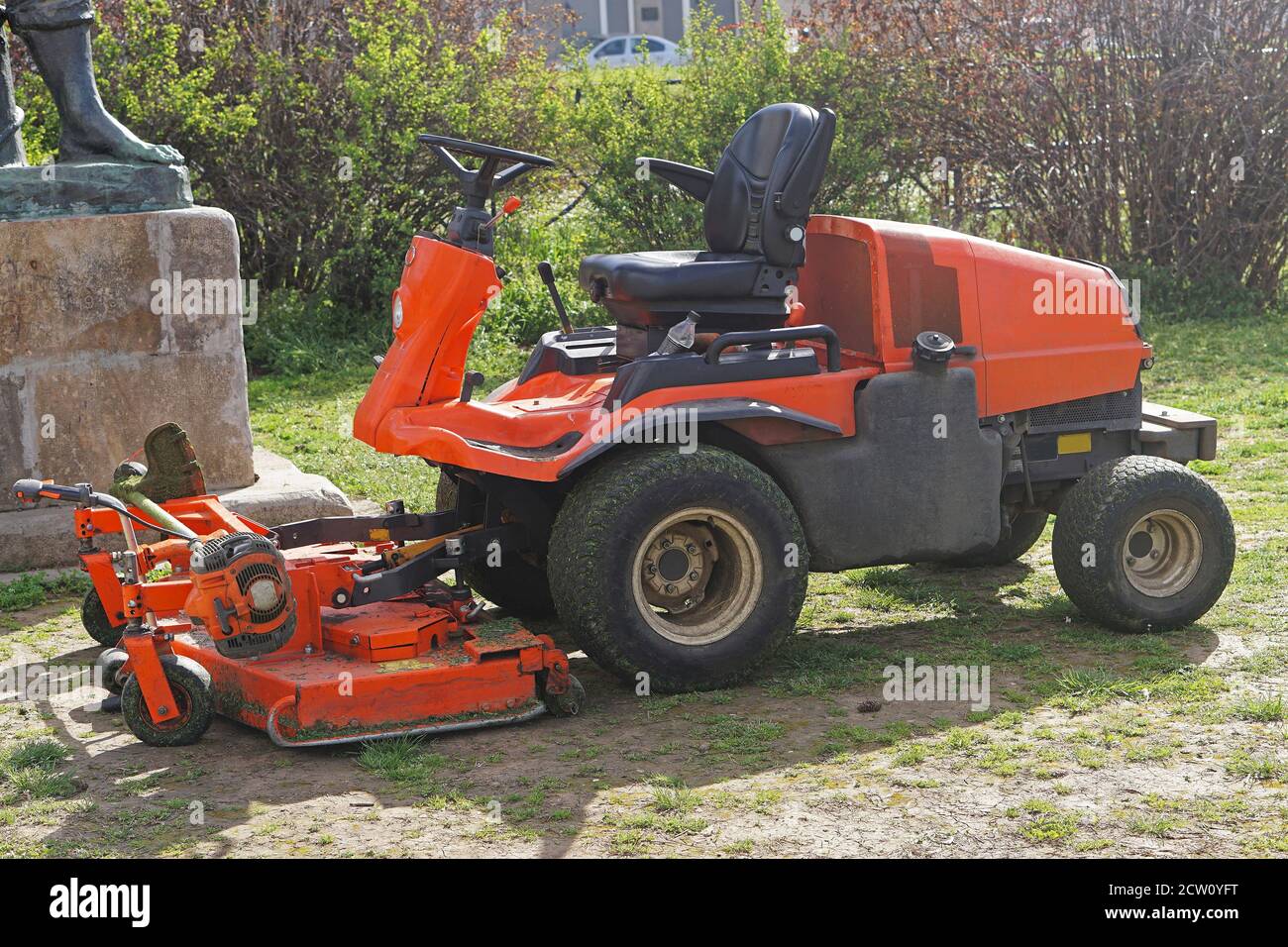 Ride on lawn mower machine in park Stock Photo - Alamy