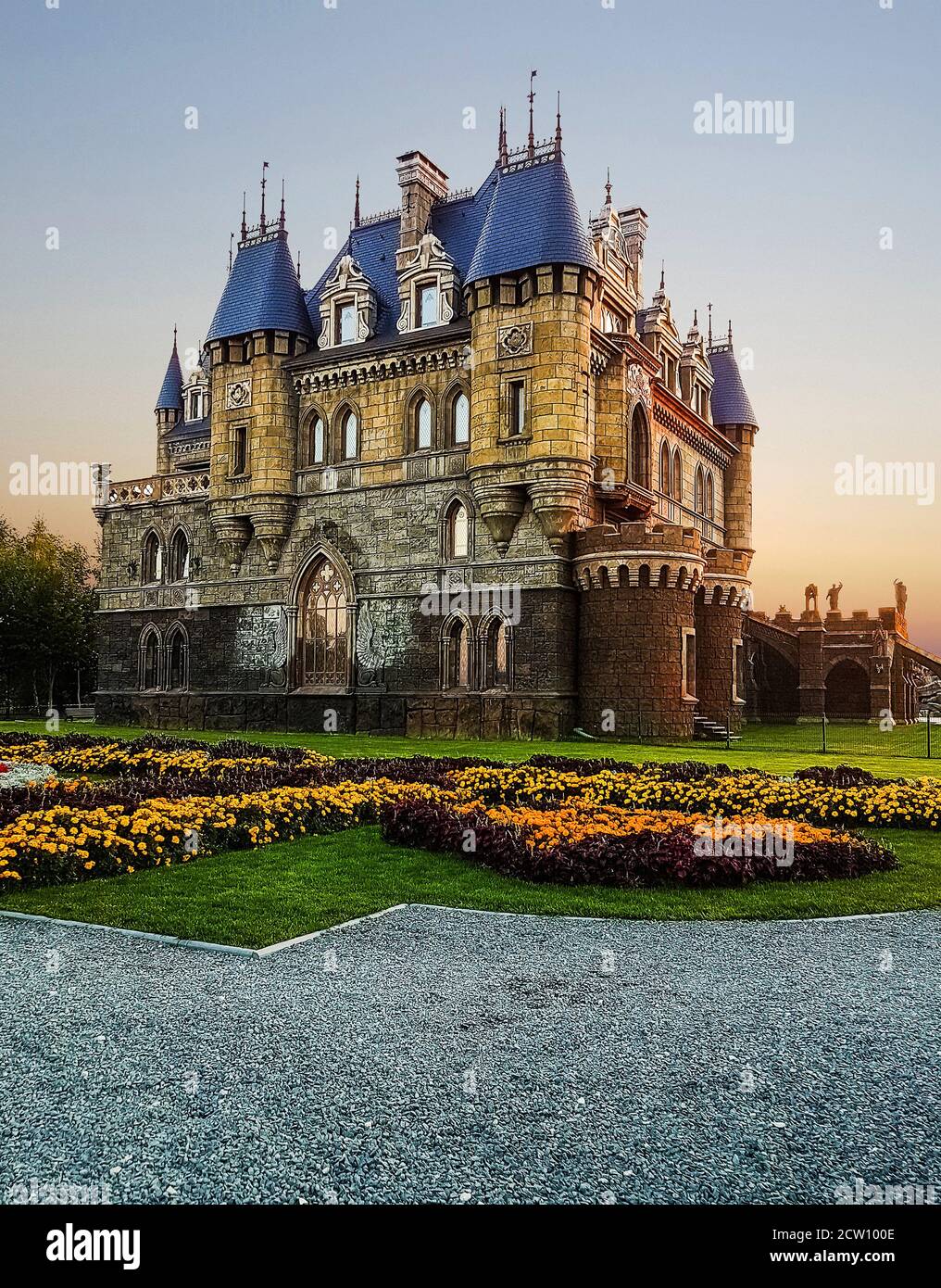 Beautiful gothic castle facade at sunset tme Stock Photo - Alamy