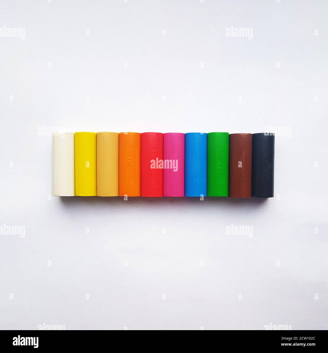 Plasticine sticks of different colors on white background Stock Photo ...