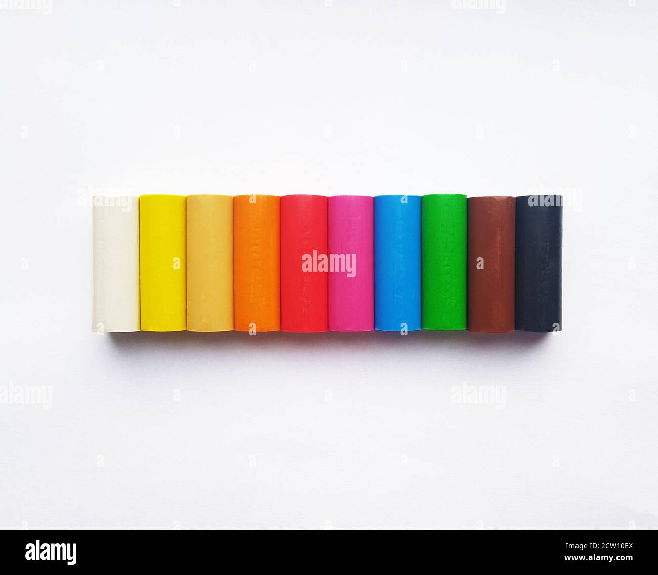 Plasticine sticks of different colors on white background Stock Photo ...